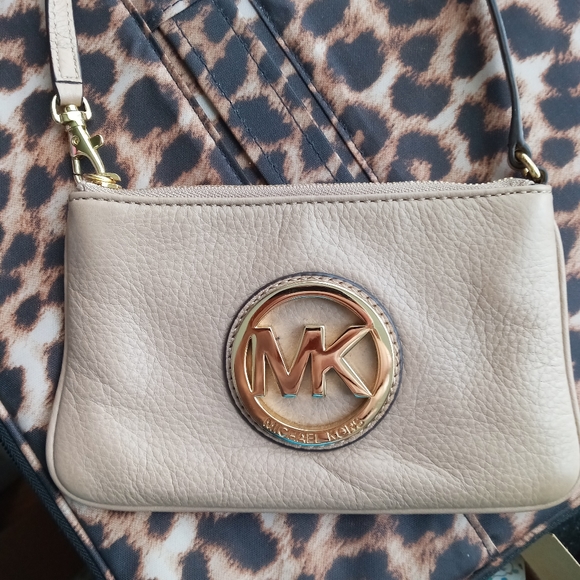 Michael Kors | Bags | Michael Korstan Leather Wristlet Large Mk Logo ...